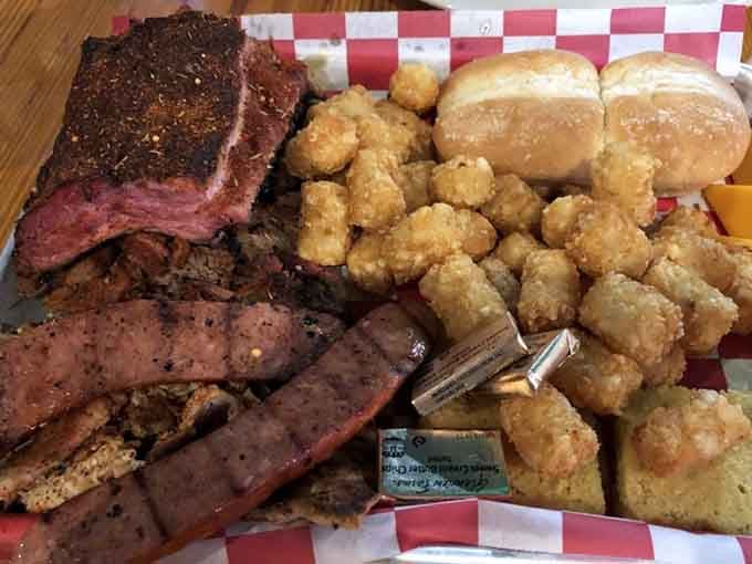 Brisket, ribs, sausage, and tots all sharing one basket, because some friendships just work.