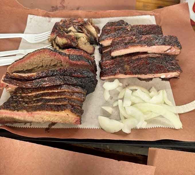 Brisket and ribs sharing a tray together, proof that some friendships are simply meant to be.