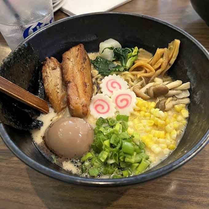 The Tonkotsu Ramen arrives loaded with pork belly, narutomaki, beech mushrooms, corn, and a perfectly brined egg.