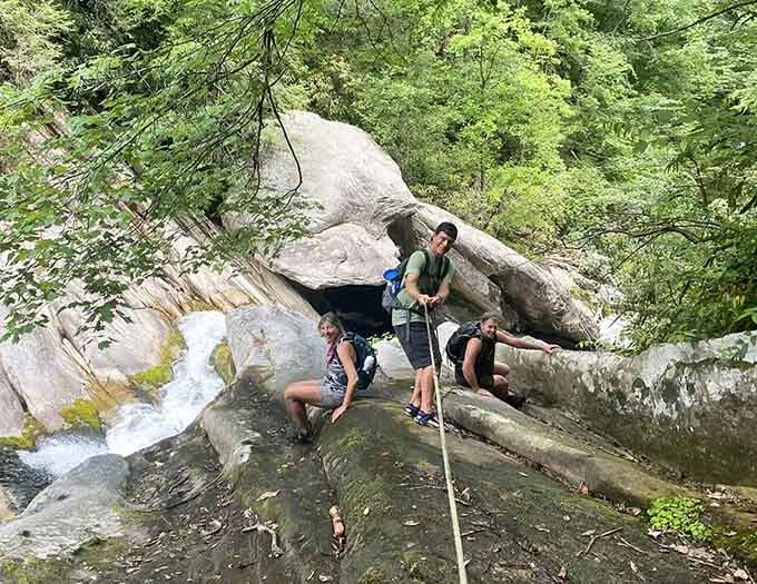 Everyone's figured out that this waterfall was worth every rocky, root-covered step to reach.