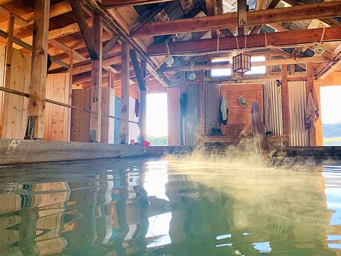 Steam rises like nature's own special effects, proving that the best spa treatments come straight from the earth.