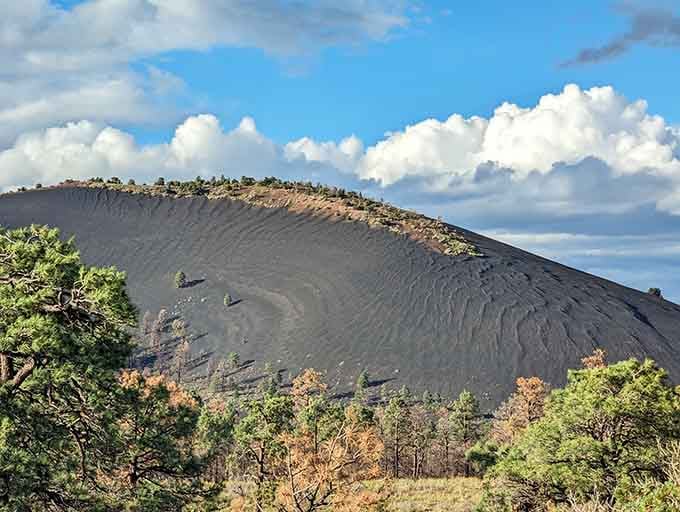 Those rippling cinder ridges on the crater's face look like something sculpted by a very ambitious artist.