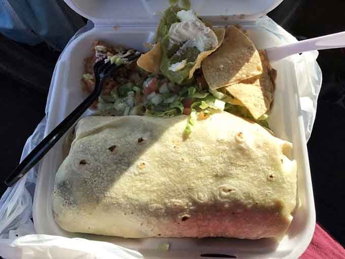 That burrito isn't just filling a container, it's practically auditioning for its own zip code.