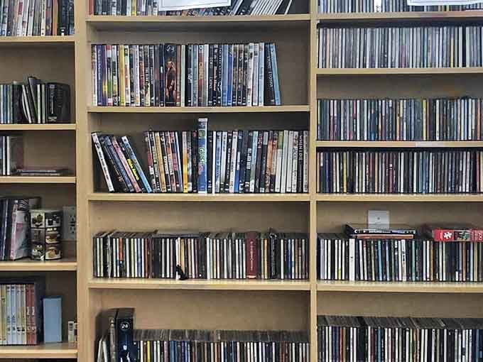 Rows of DVDs and CDs that could keep you entertained for an entire Florida rainy season, no streaming required.