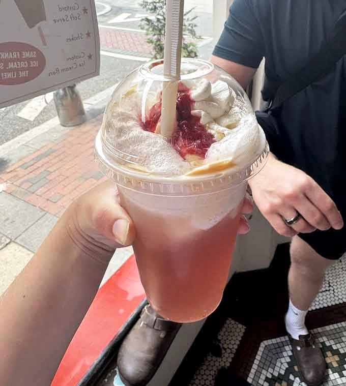 Piled high with whipped cream and fruit, this ice cream soda is the kind of thing dreams are made of.