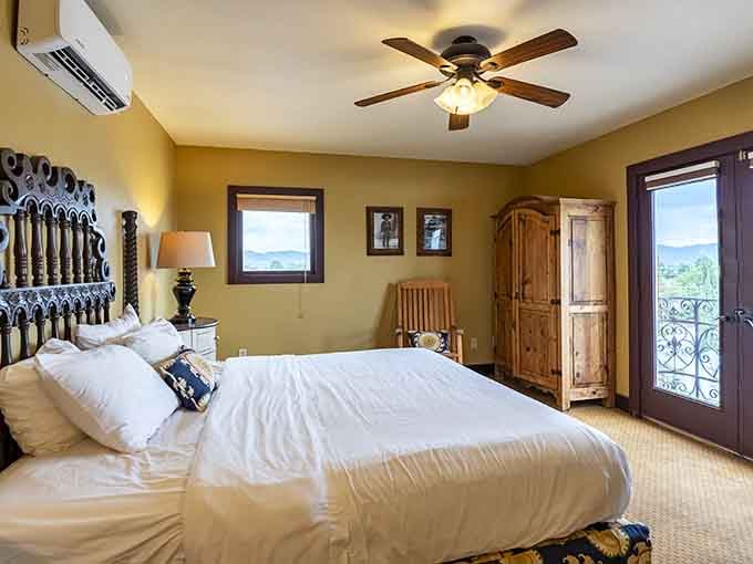 A carved wooden headboard, mountain views through the window, and fresh white linens. Sleep well, friend.