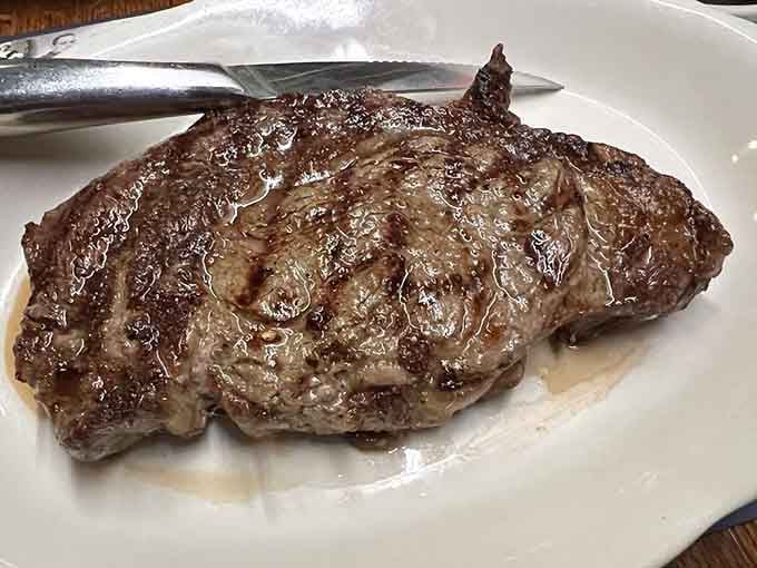 This ribeye has the kind of char and marbling that makes you understand why people write love songs about beef.