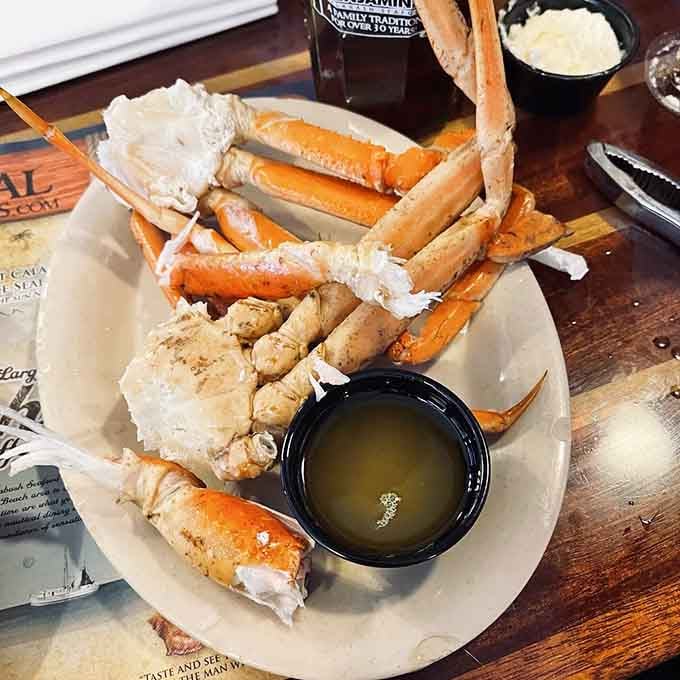 Snow crab legs piled high with melted butter, because subtlety has no place at an all-you-can-eat buffet.
