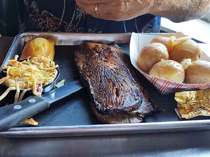 That brisket on a tray is not asking for your attention. It's commanding it, and rightfully so.