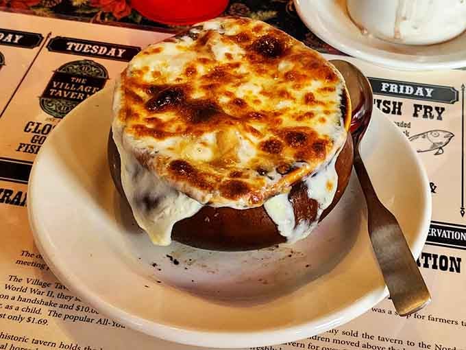 French onion soup with that gloriously melted cheese blanket&mdash;proof that some culinary traditions never go out of style for good reason.
