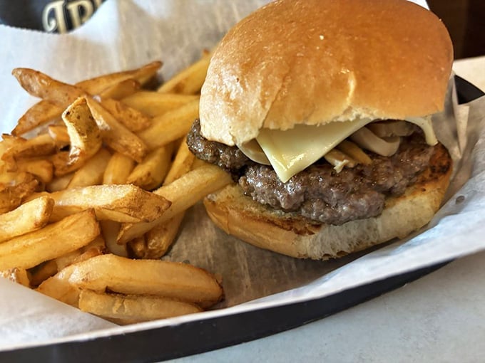 A mushroom Swiss burger and golden fries so satisfying, you'll forgive yourself for eating every last one.