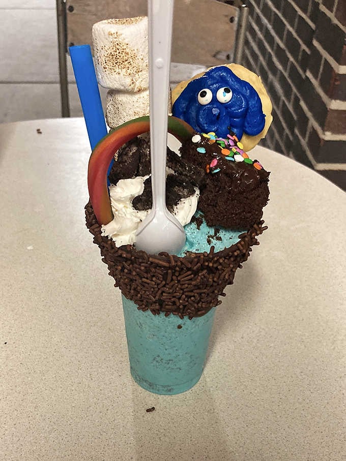 This Cookie Monster shake proves that sometimes the most joyful things in life are covered in sprinkles and topped with a brownie.