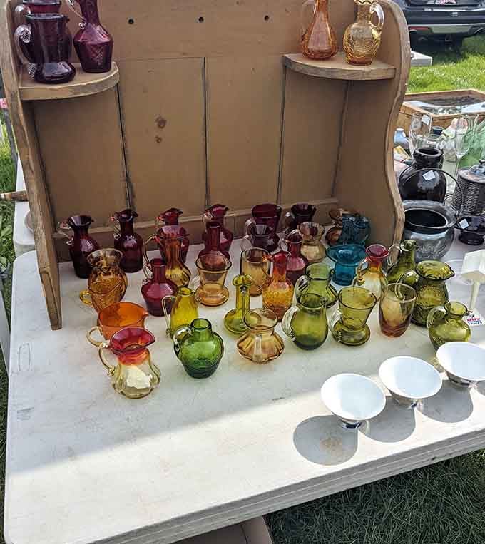 A rainbow of vintage glass pitchers that would make your grandmother's china cabinet weep with envy.