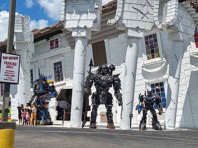 Three massive metal warriors guard the entrance, and honestly, you feel a little underdressed walking past them.