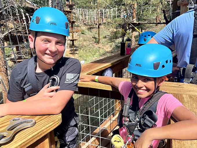 Two kids, two helmets, and approximately zero interest in going back to school on Monday.