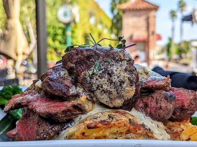 A mountain of beautifully cooked steak with the historic depot clock tower watching over it. Dinner and a view.