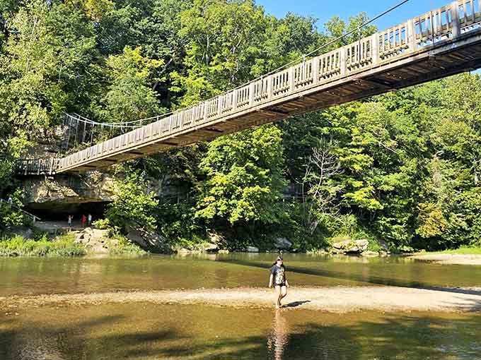Standing knee-deep in Sugar Creek beneath that swaying bridge, you realize some offices have terrible views.