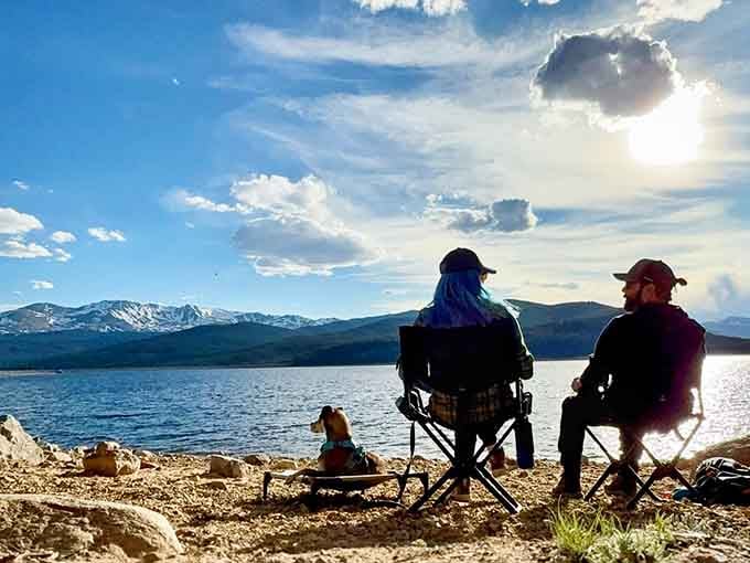 Two chairs, one dog, and a mountain view that makes every other weekend plan feel deeply inadequate.