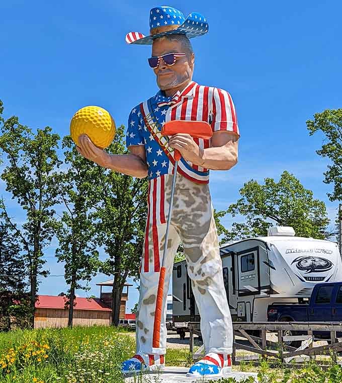 This patriotic Muffler Man stands tall, holding a golf ball, and daring you not to smile.