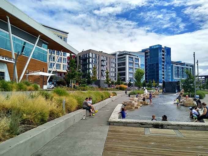 Kids, rocks, water, and sunshine. The Vancouver Waterfront's splash area is basically nature's greatest babysitter.