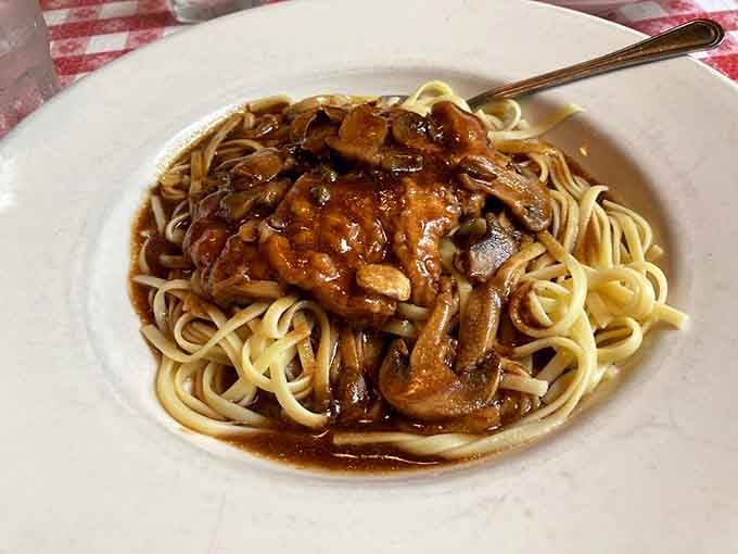 Chicken Marsala that looks like it could solve all your problems, or at least make you forget them.