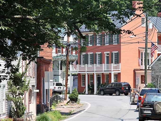 Brick facades, white balconies, and American flags. Waterford's town center looks like a painting that refused to be painted over.