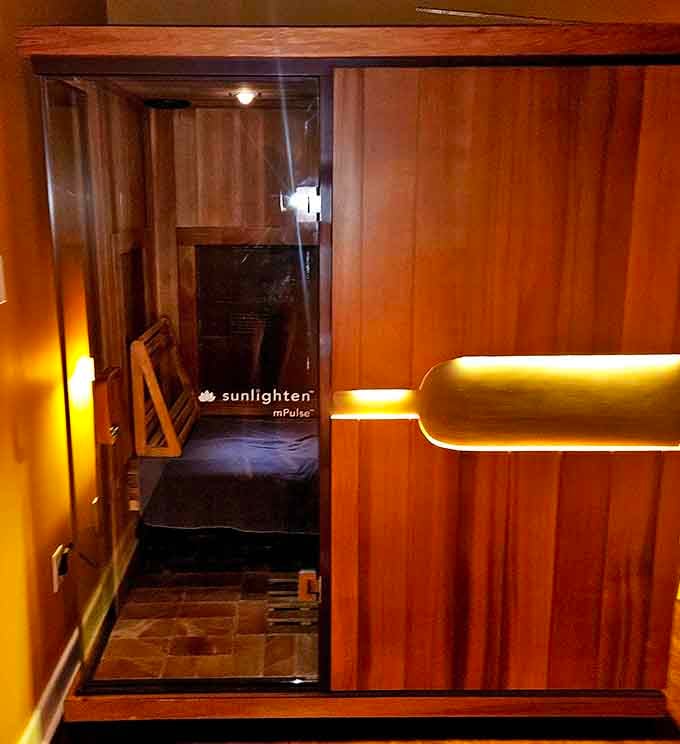 The Sunlighten mPulse infrared sauna sits ready and waiting, like a warm hug you can actually step inside.