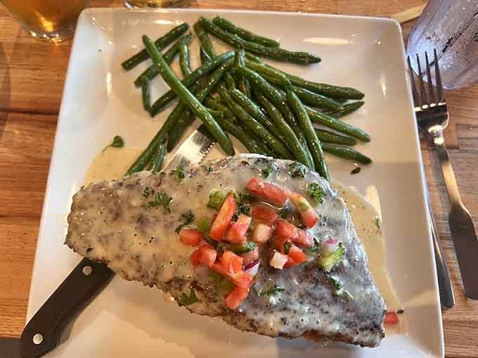 Pistachio crusted walleye with a creamy sauce and fresh pico. Minnesota on a plate, dressed for a night out.