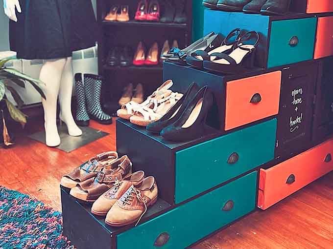 Shoes displayed like artwork on a staircase of colorful drawers. Cinderella would absolutely lose her mind here.
