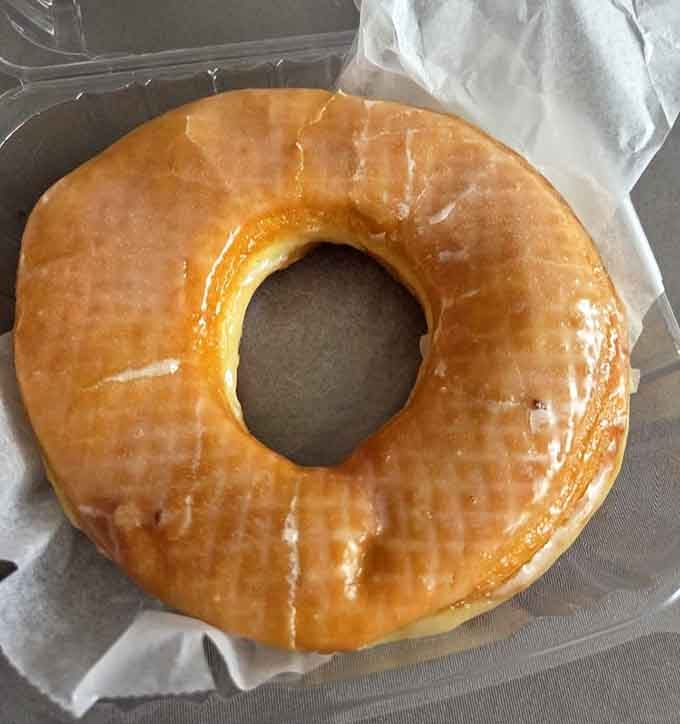 That golden glaze, that pillowy dough, this right here is the glazed donut that other donuts wish they could be.
