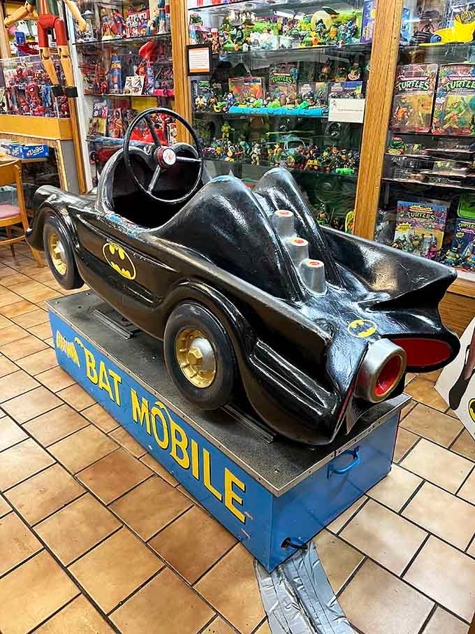 A pedal-powered Batmobile at the World's Largest Toy Museum Complex. Batman never looked this adorably road-ready.