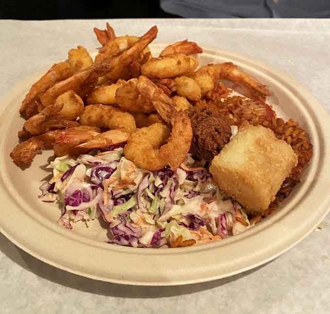 Golden, crispy, and piled high, this fried shrimp platter is the reason people rearrange their entire weekend plans.