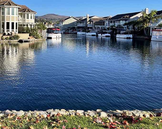 Boats docked, hills in the background, and not a care in sight. East Lake living looks suspiciously like a vacation that never ends.