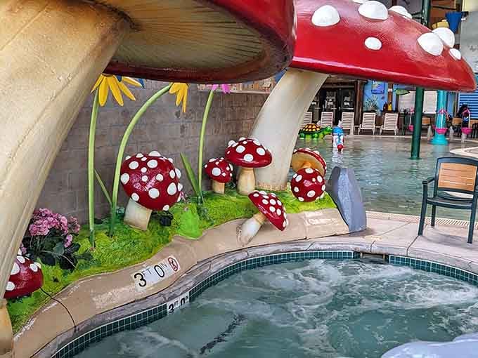 Red polka-dot mushrooms standing guard over a bubbling pool, because apparently this waterpark also moonlights as an enchanted garden.