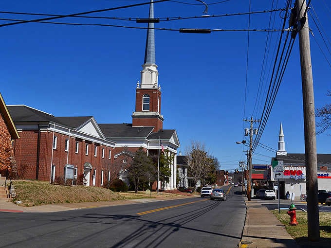 Church steeples pierce the skyline like exclamation points, declaring that faith and community still anchor life in these peaceful streets.