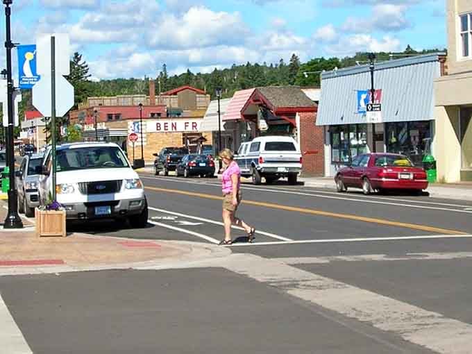 Sunny skies, pine-covered hills, and one very determined pedestrian &mdash; Grand Marais has a magnetic pull that's hard to explain and impossible to resist.
