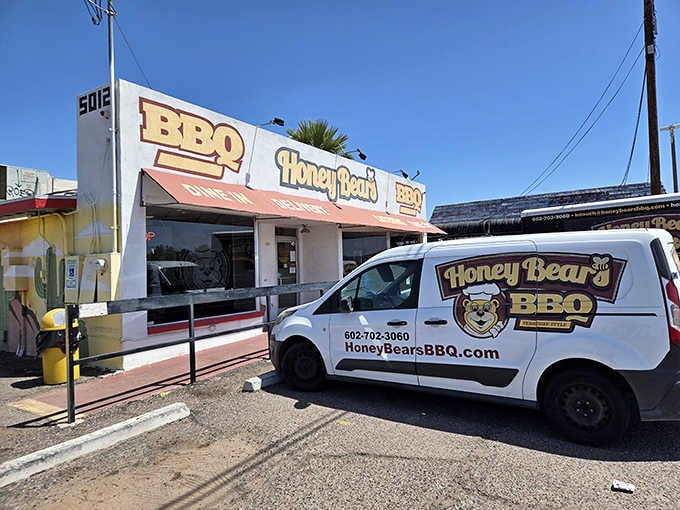 That cheerful bear mascot and bold signage make finding your BBQ fix easier than a Sunday morning crossword puzzle.