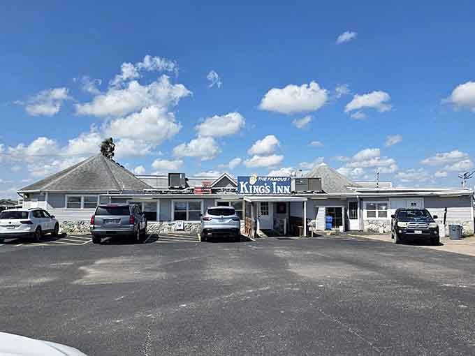 That full parking lot under a big South Texas sky tells you everything you need to know before you even read the menu.