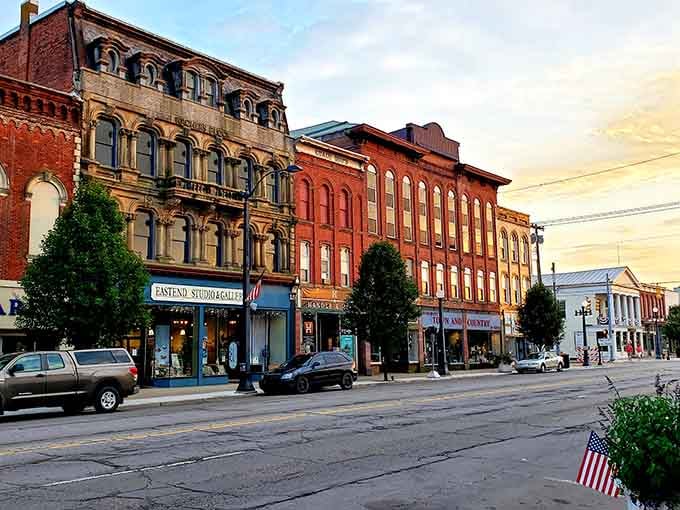 Golden hour transforms historic brick facades into something Norman Rockwell would've painted if he'd visited Michigan.
