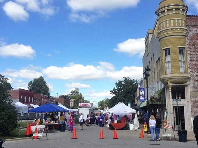 Sunny festival tents welcome your arrival as you explore the lively, historic streets and unique charm found throughout Midway.