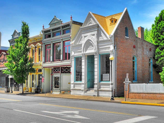New Harmony's ornate Victorian storefronts stand shoulder to shoulder like well-dressed guests at a very sophisticated garden party.