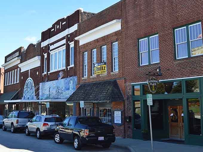 Roxboro's brick storefronts and hand-painted murals give this downtown block the kind of character money simply cannot manufacture.