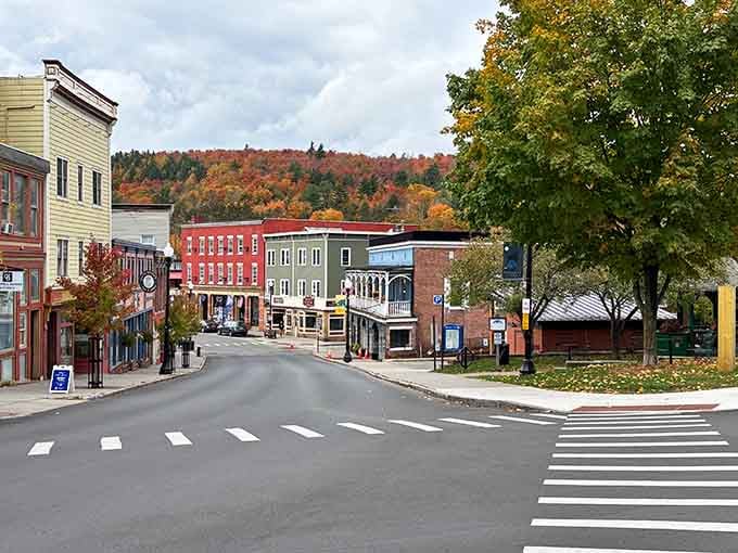 Downtown Saranac Lake's colorful storefronts pop against autumn hills like a box of crayons spilled across the landscape.