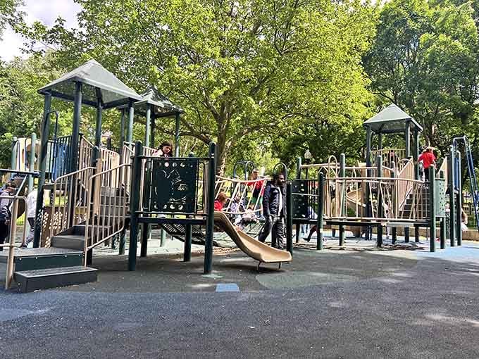 Multiple play structures mean no waiting in line, just pure playground bliss under nature's perfect shade umbrella.