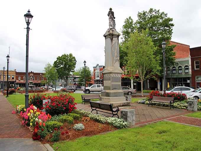Washington's town square bursts with red roses and iron benches, the kind of place where you sit down and forget to leave.