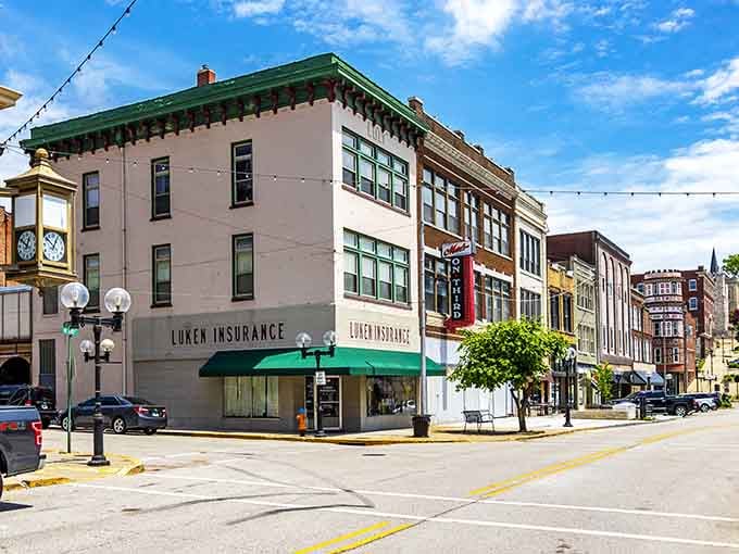 Sunlit storefronts and a vintage clock tower give Alton's downtown corner the kind of timeless polish that money can't manufacture.