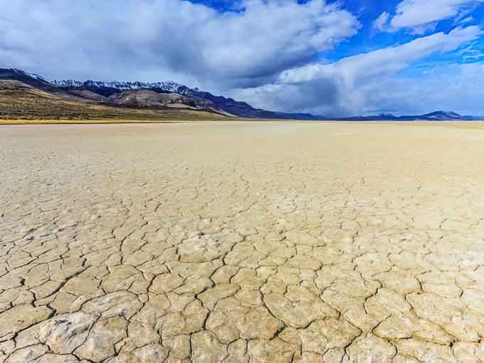 Snow-capped peaks looming over a pale, cracked lakebed prove Oregon's desert is every bit as dramatic as its coastline.