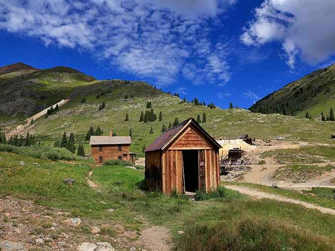 Cedar-sided structures dot the open hillside at Animas Forks, scattered across the landscape like a history lesson nobody assigned but everyone should take.
