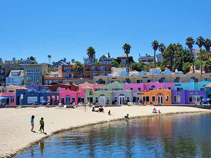Sun-drenched sand, calm lagoon waters, and a rainbow row of buildings make Capitola look almost too cheerful to be real.