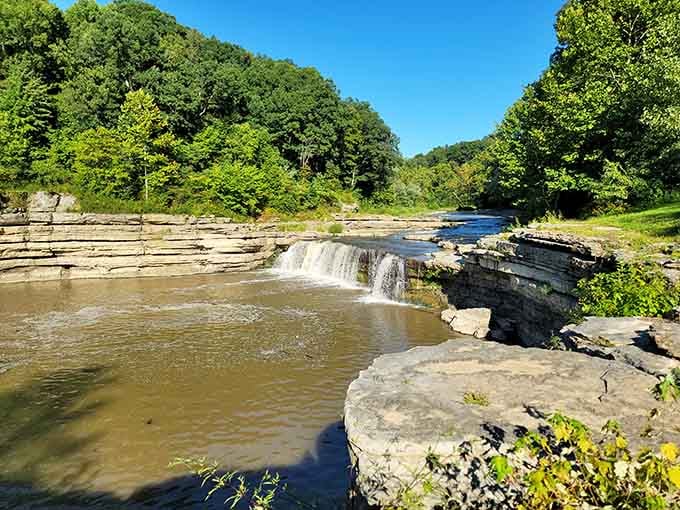 Flat limestone ledges frame Indiana's largest waterfall like a natural amphitheater built just for this moment.